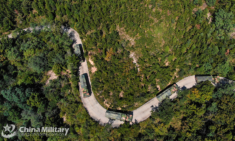 Missile launching vehicles en route to designated area - Global Times