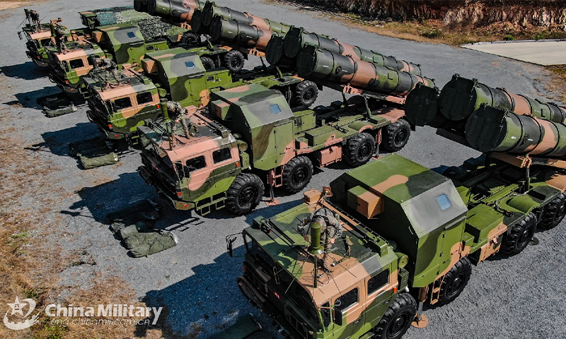 Missile launching vehicles en route to designated area - Global Times