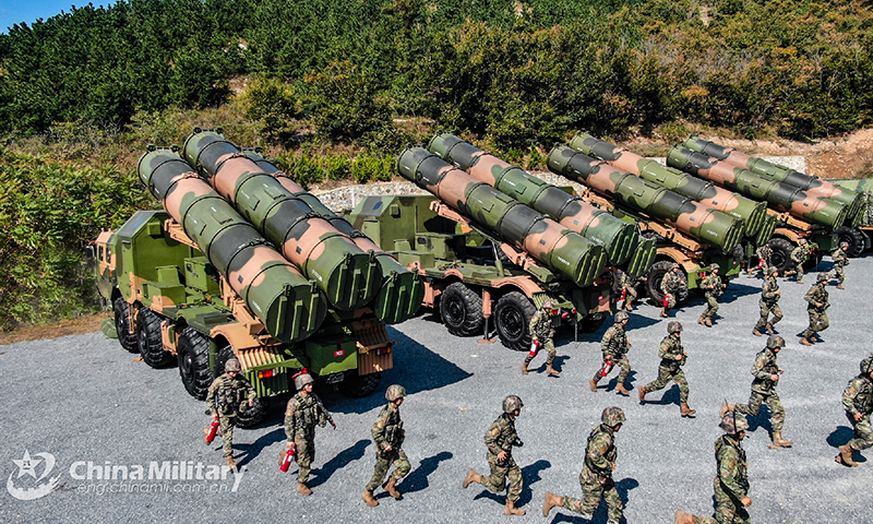 Missile launching vehicles en route to designated area - Global Times