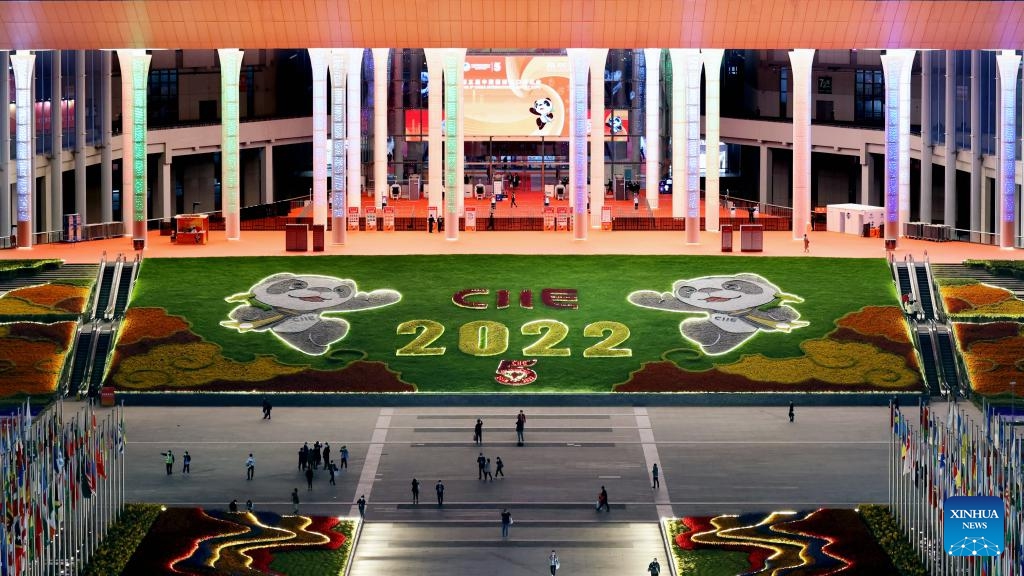 Night view of National Exhibition and Convention Center in Shanghai ...