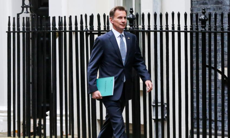 UK chancellor announces tax hikes, spending cuts to restore finances ...