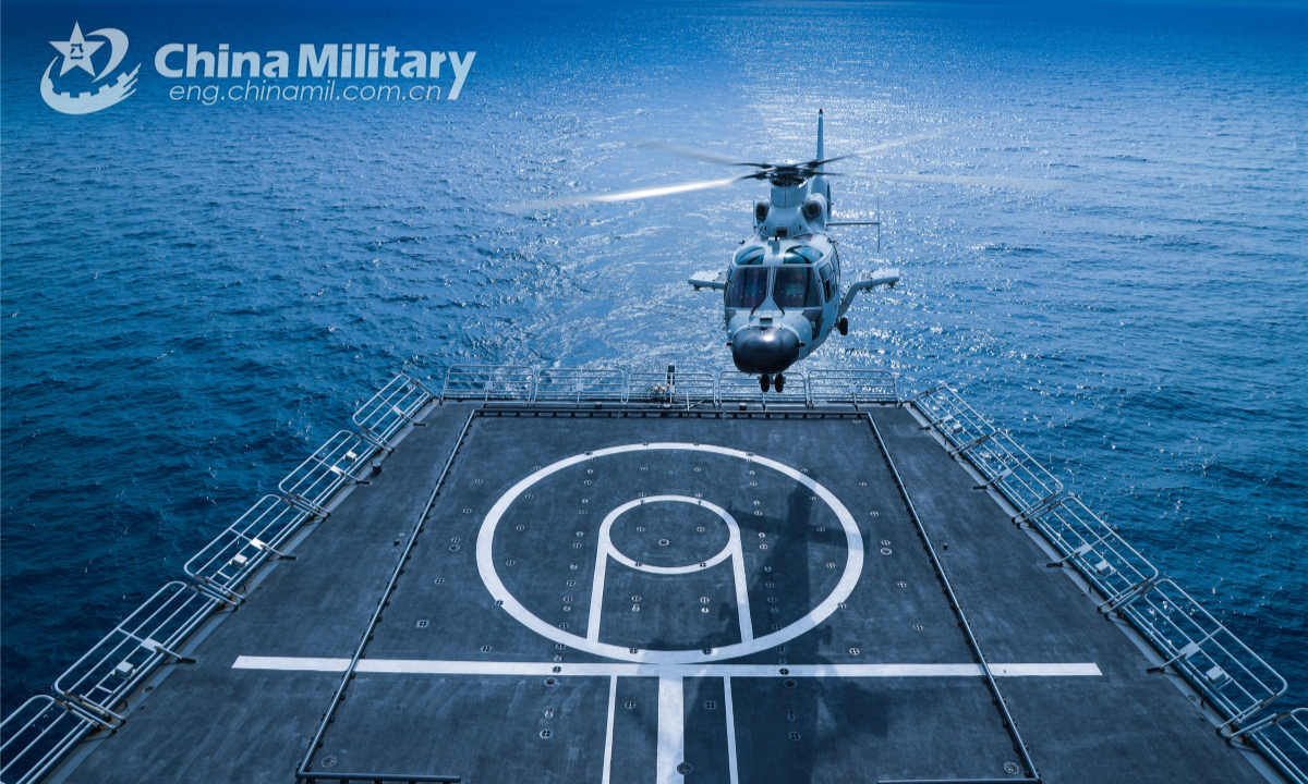 Ship-borne helicopter in takeoff and landing training - Global Times