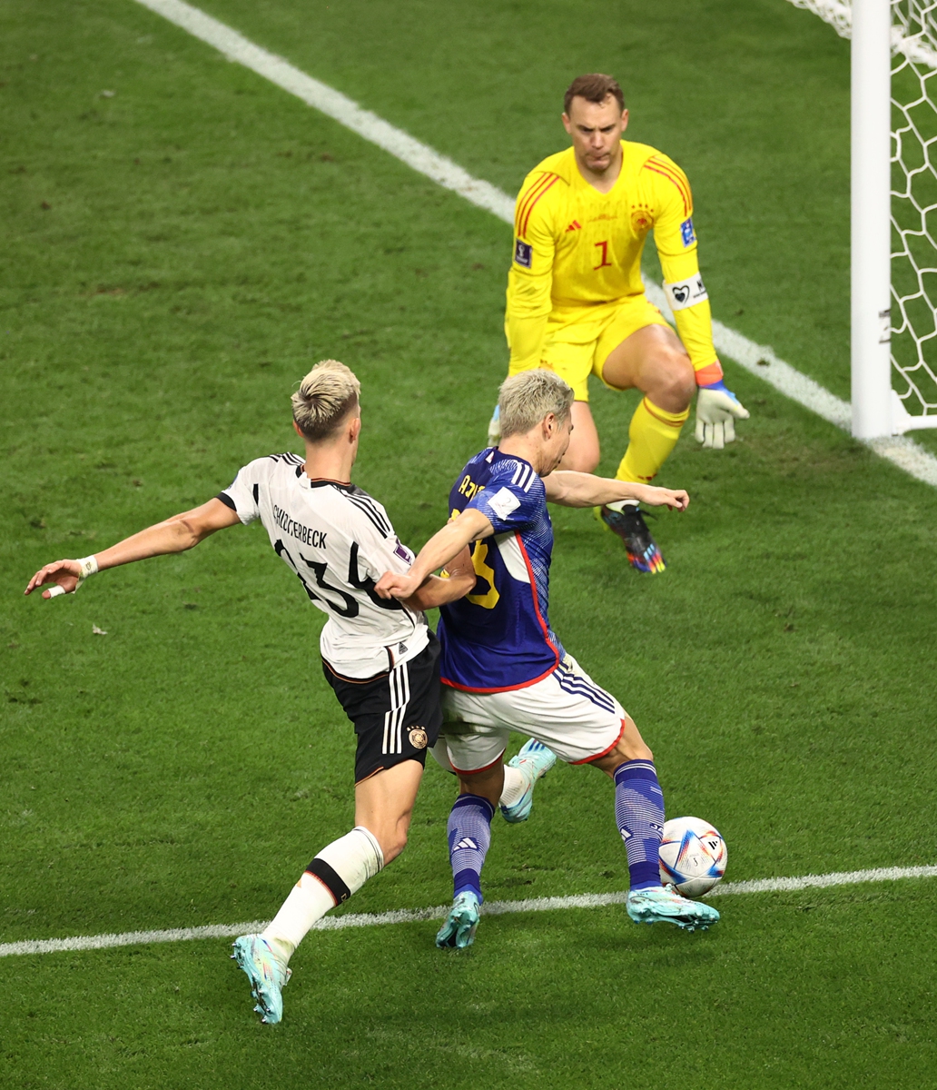 Japan stun Germany with late strikes - Global Times