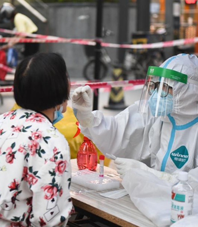 COVID testing companies roll back businesses as more Chinese cities ...