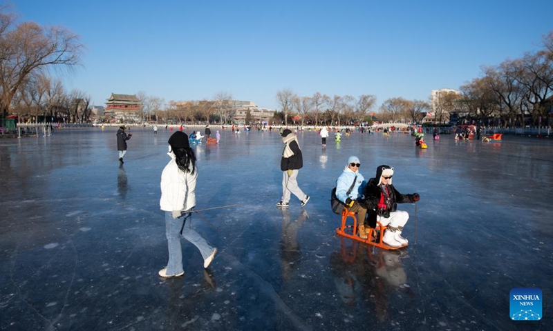 People play on frozen Shichahai lake in Beijing - Global Times