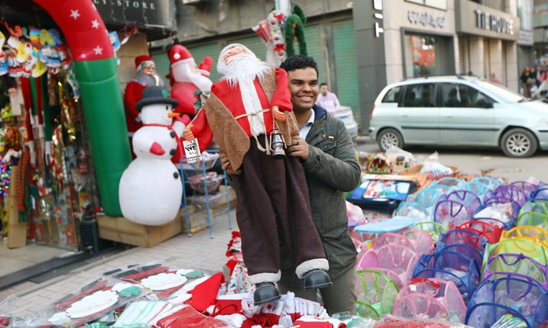 Egyptians shop for New Year, Christmas gifts amid dire economy - Global ...