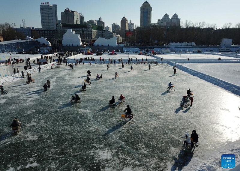 Tourists play at Ice and Snow Carnival park in Harbin - Global Times