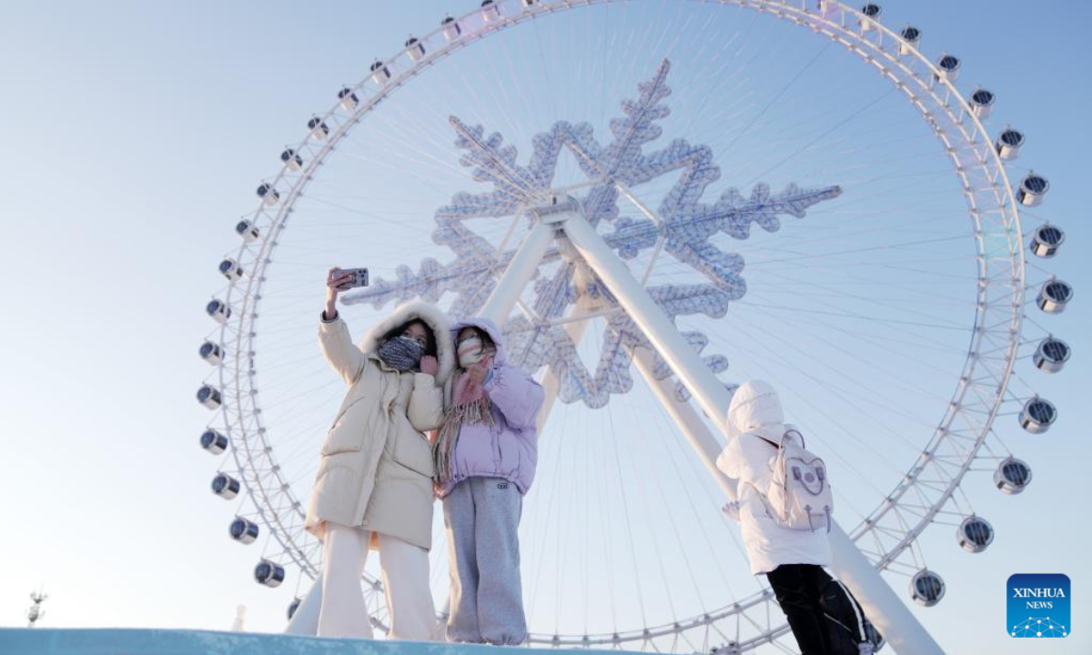 People enjoy themselves at Harbin Ice and Snow World - Global Times