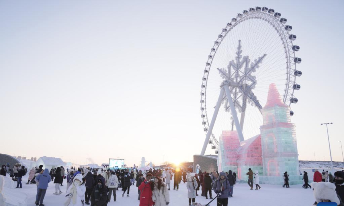 People enjoy themselves at Harbin Ice and Snow World - Global Times
