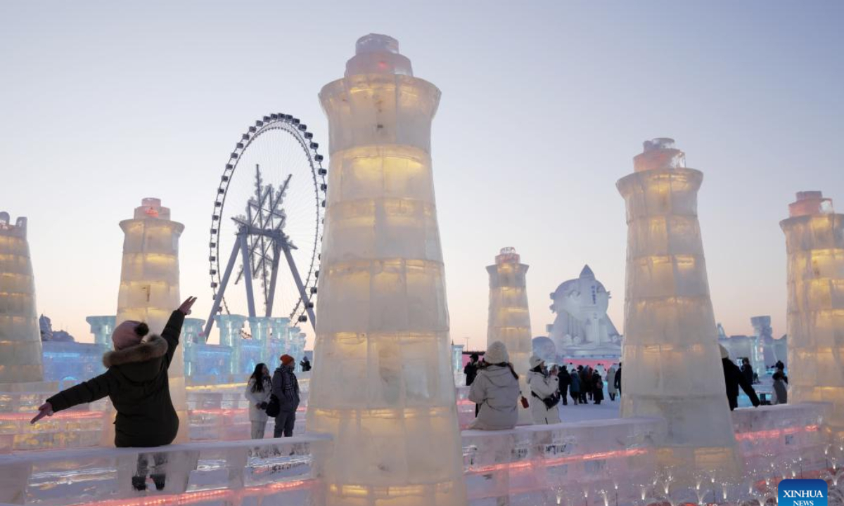 People enjoy themselves at Harbin Ice and Snow World - Global Times