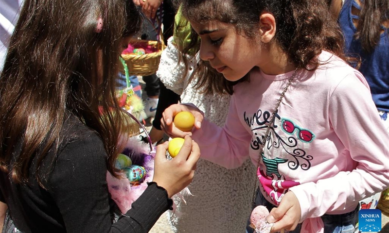 People in south Lebanon play egg tapping to celebrate Easter - Global Times