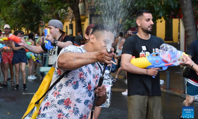 Water-splashing festival held in Madrid, Spain - Global Times
