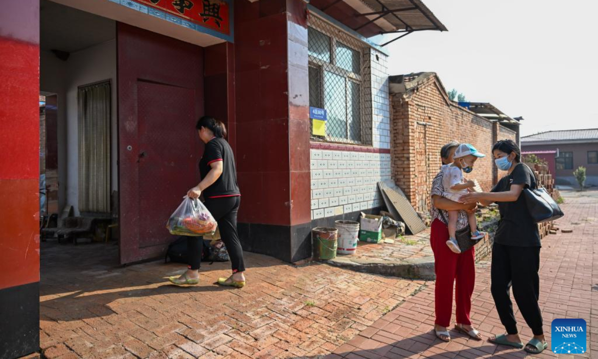 Flood-affected villagers return home in China's Tianjin - Global Times