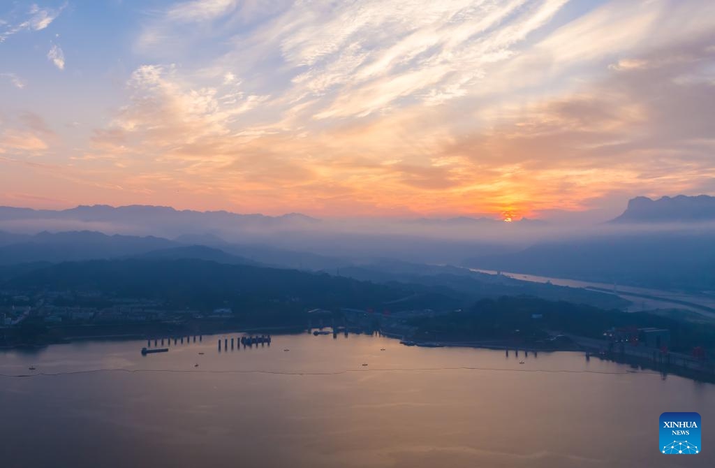 Scenery of sunrise over Three Gorges dam in Zigui County, C China ...