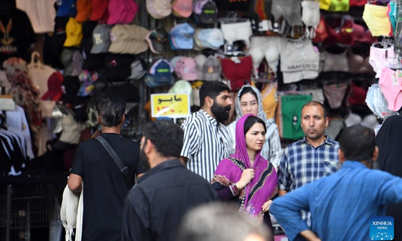 People shop at bazaar in Tehran, Iran - Global Times