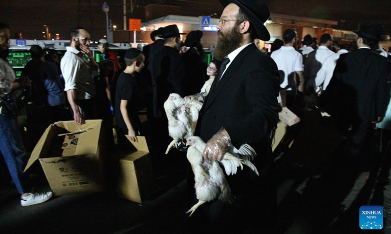 Kaparot ceremony in Tel Aviv, Israel - Global Times