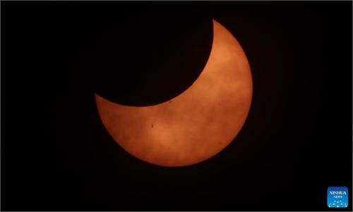 People observe solar eclipse across world - Global Times