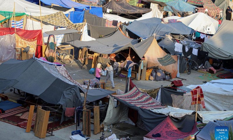 Displaced Palestinians take shelter in UNRWA installations - Global Times