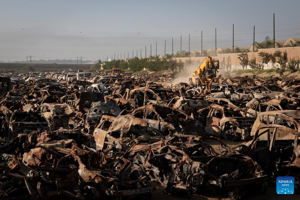 Vehicles burnt in attack by Gaza-ruling Hamas militants on Israeli ...