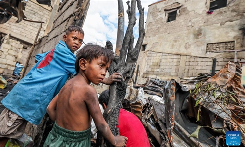 Aftermath of fire at slum area in Manila - Global Times