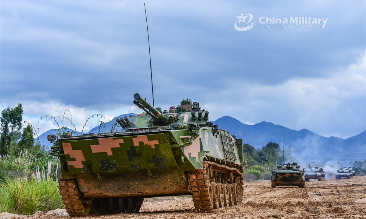 Armored vehicles maneuver to designated areas - Global Times