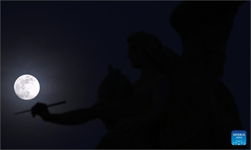 View of moon and statue - Global Times