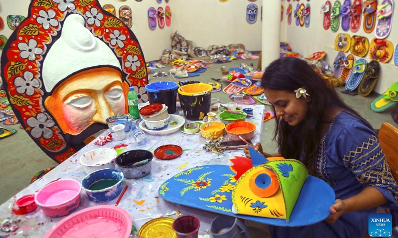 Students paint traditional paper works for Bengali New Year in ...