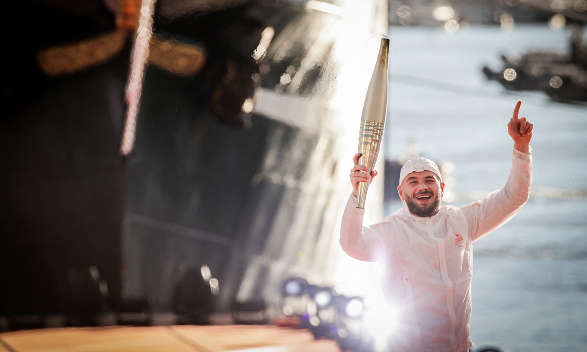 Lighting the torch - Global Times