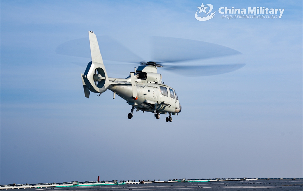 Chopper lifts off from landing ship - Global Times