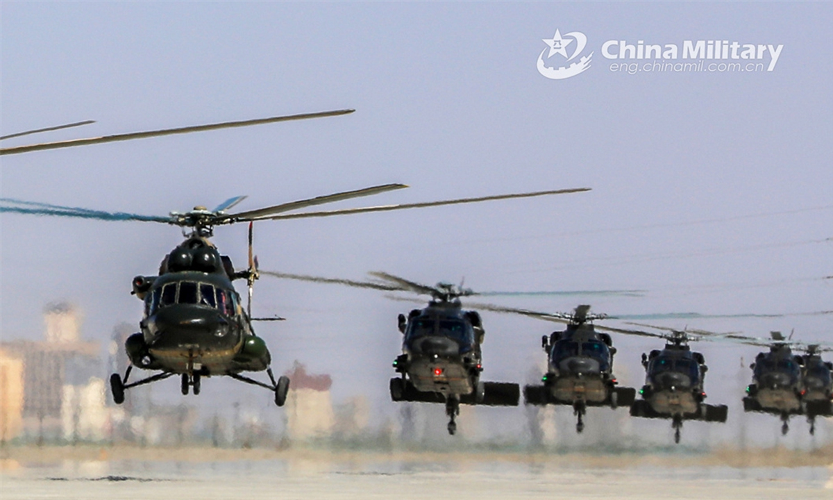 Helicopters hover at ultra-low altitude - Global Times