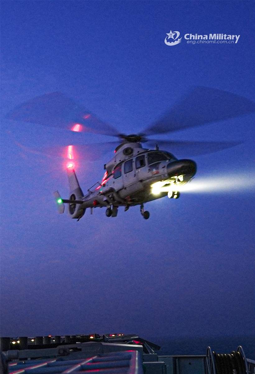 Chopper lifts off from landing ship - Global Times