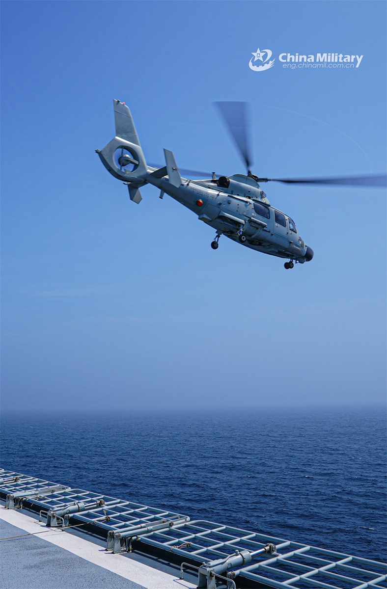 Chopper lifts off from landing ship - Global Times