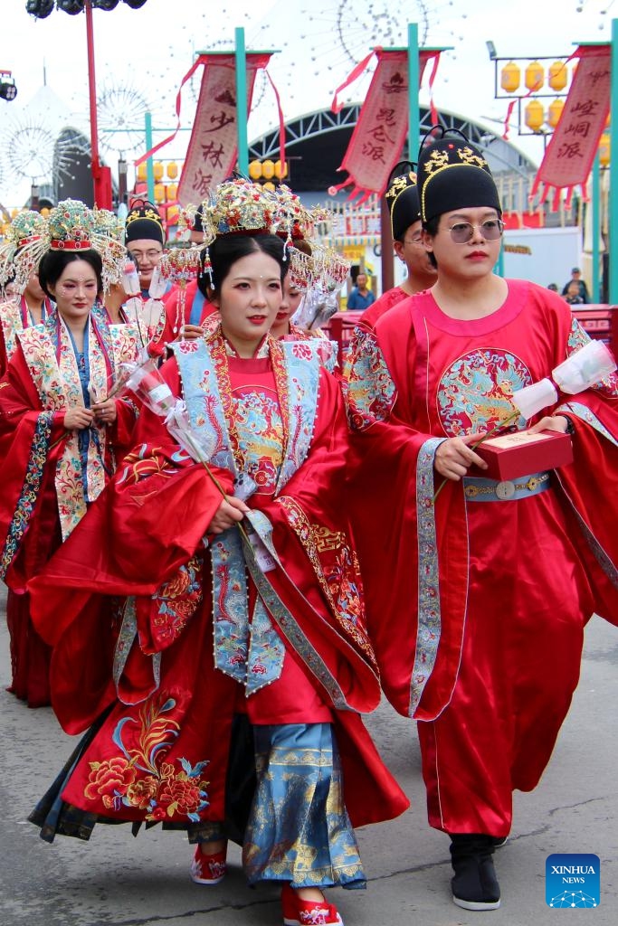 Ten couples participate in group wedding in Shiyan, China's Hubei ...