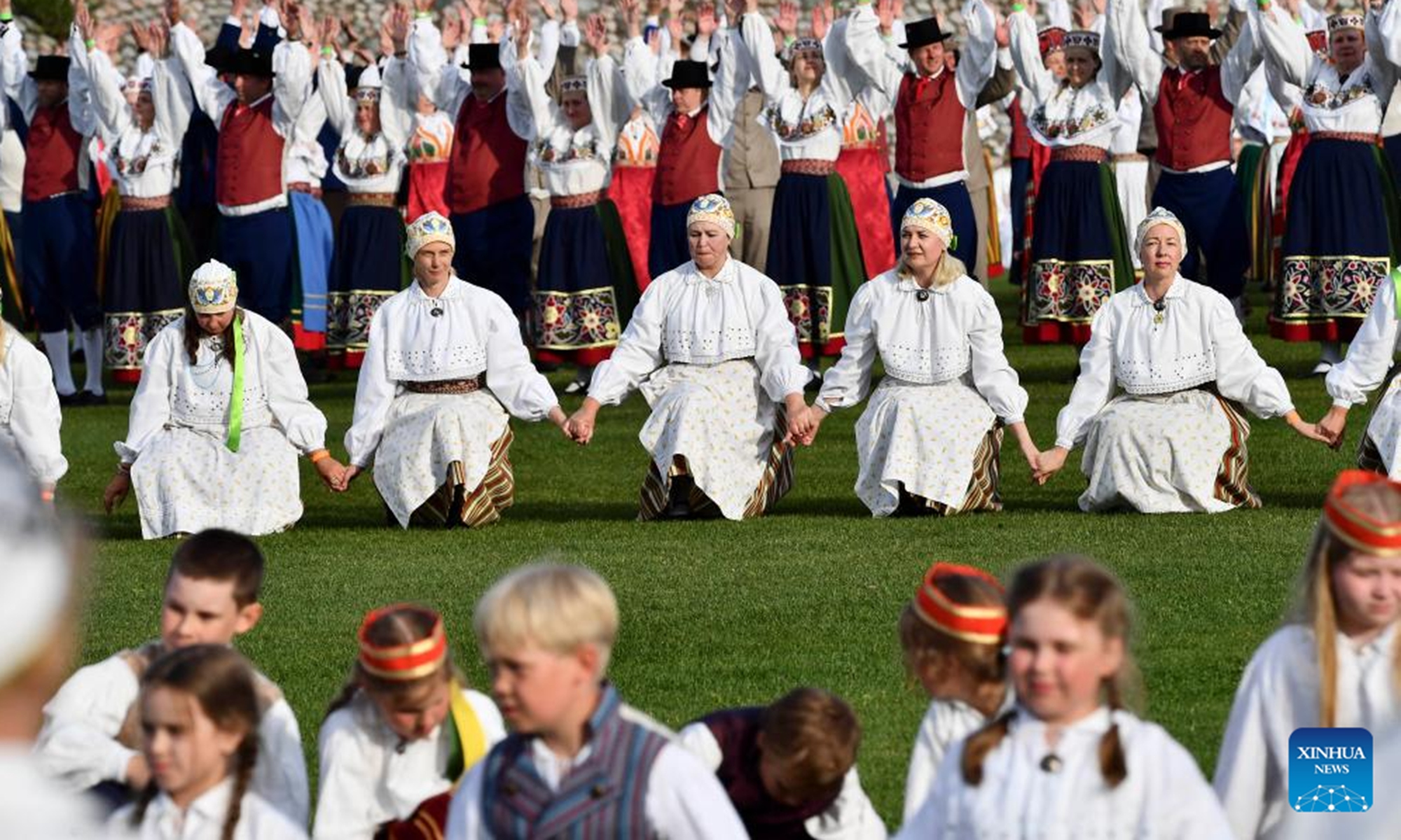 Folk dancers take part in dance celebration in Johvi, Estonia - Global ...