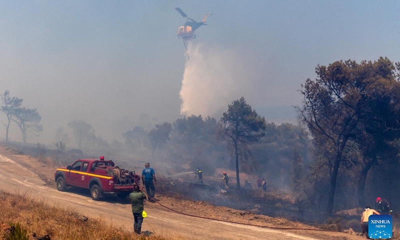 Firefighters try to put out wildfire in Keratea, Greece - Global Times