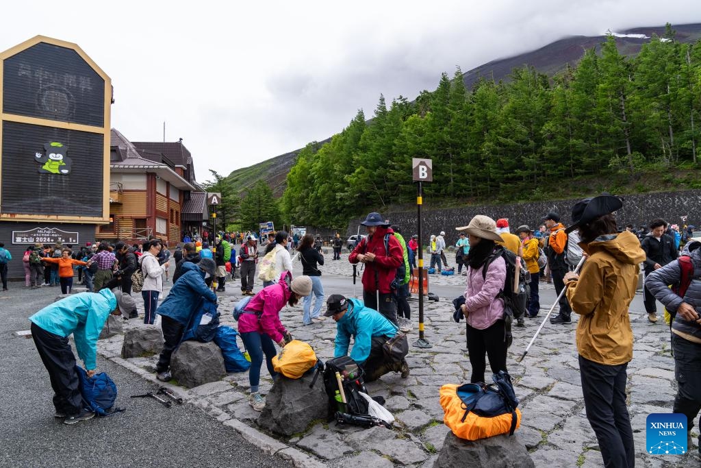 Climbing season kicks off at Japan's Mt. Fuji with new restrictions ...