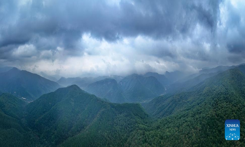 View of Liupanshan National Forest Park shrouded in clouds in Ningxia ...