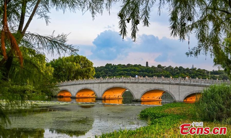 Golden sunlight shines through bridge arches in Nanjing - Global Times