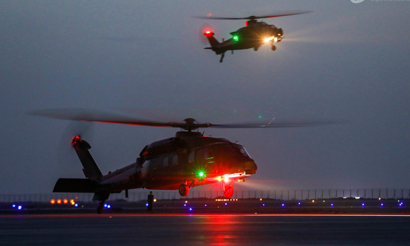 Choppers conduct round-the-clock flight training - Global Times