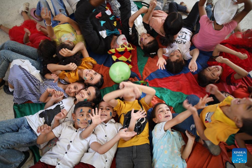 Local children participate in entertainment activity in Al-Maghazi ...