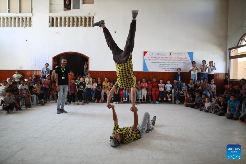 Local children participate in entertainment activity in Al-Maghazi ...
