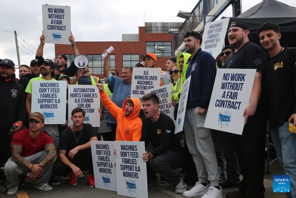 U.S. port workers on massive strike for wages, automation - Global Times