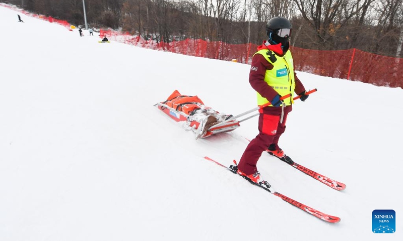 Skiing rescuer ensures safety on slopes as winter sports gain ...