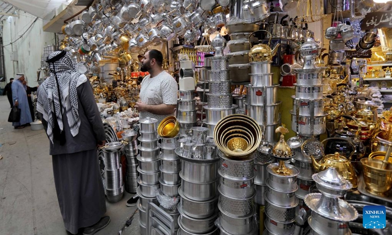 People shop at market during holy month of Ramadan in Mosul, Iraq ...