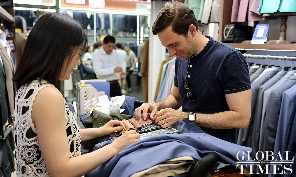 Textile market in Shanghai attracts foreign visitors seeking custom ...