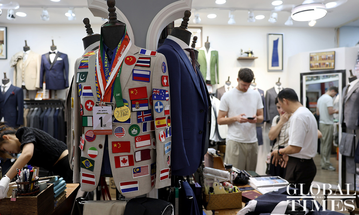 Textile market in Shanghai attracts foreign visitors seeking custom ...