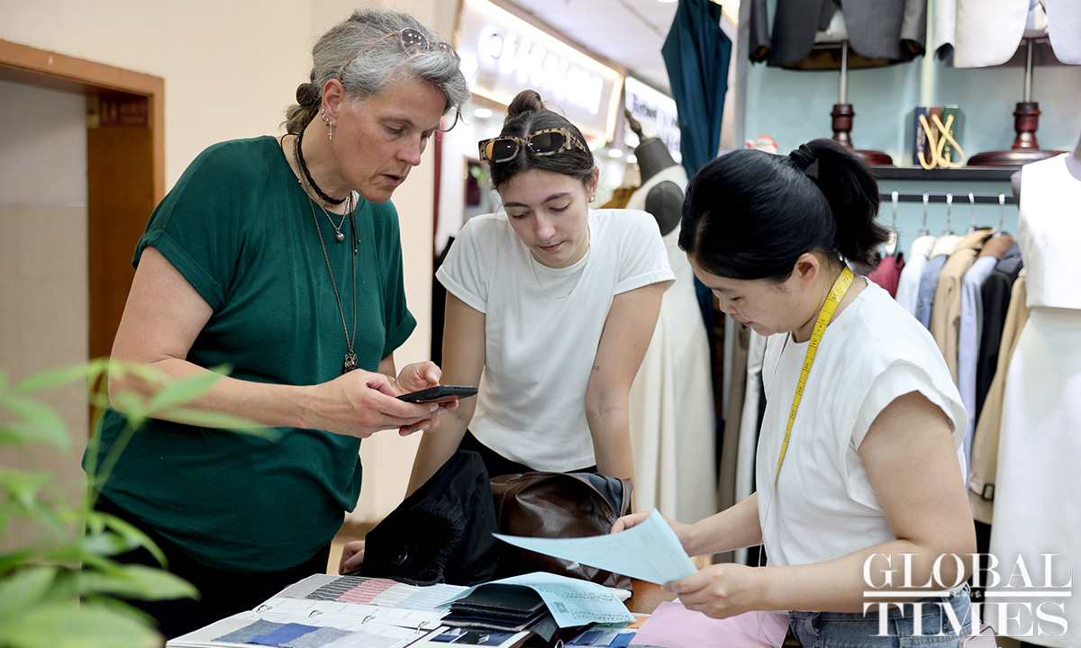 Textile market in Shanghai attracts foreign visitors seeking custom ...