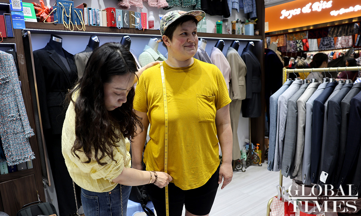 Textile market in Shanghai attracts foreign visitors seeking custom ...