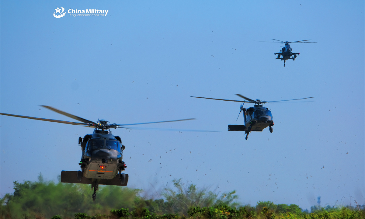 Multiple helicopters in flight training - Global Times