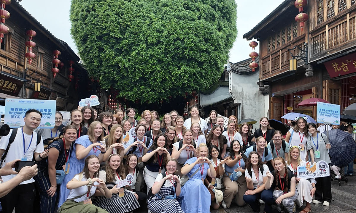 US choirs bring flash mob performance to millennium-old neighborhood in ...